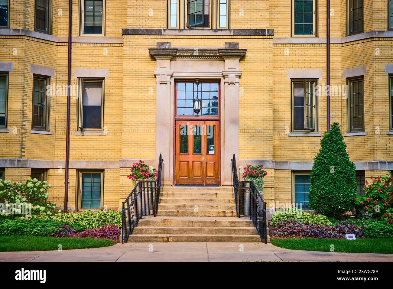 Grand Entrance of Historical Brick Building with Symmetrical Facade at ...