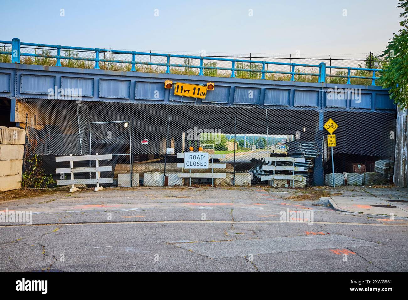 Urban Underpass Road Closure with Clearance Sign Eye-Level View Stock ...