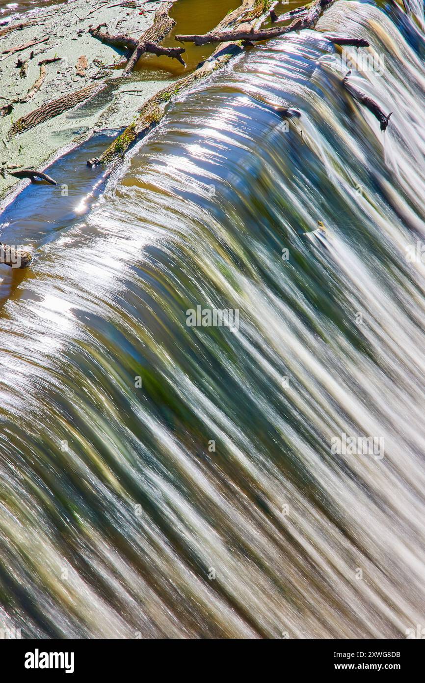 Aerial View of Waterfall Over Man-Made Weir with Logs and Branches ...