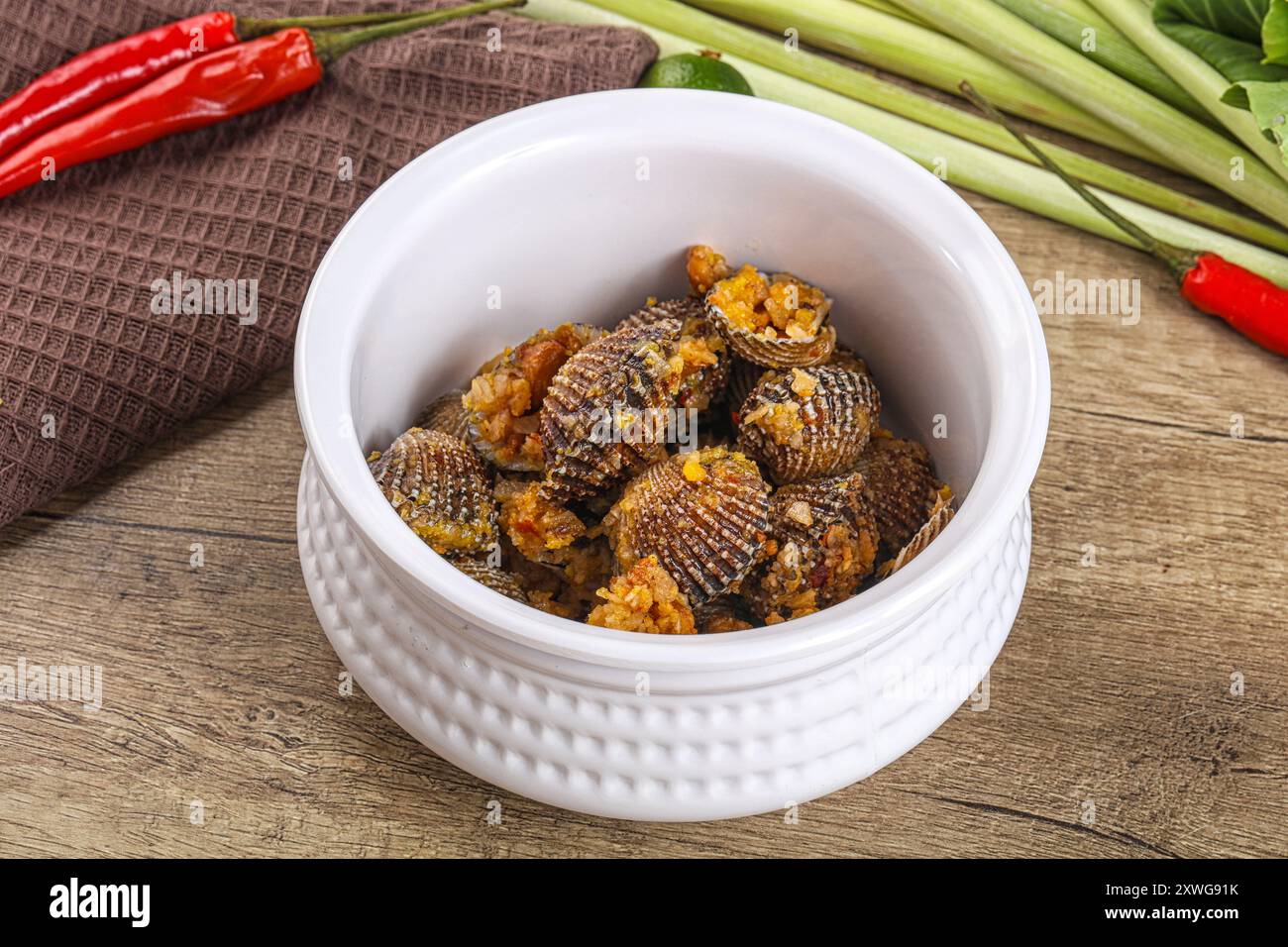 Blood Cockle Fried With Garlic and spices Stock Photo - Alamy