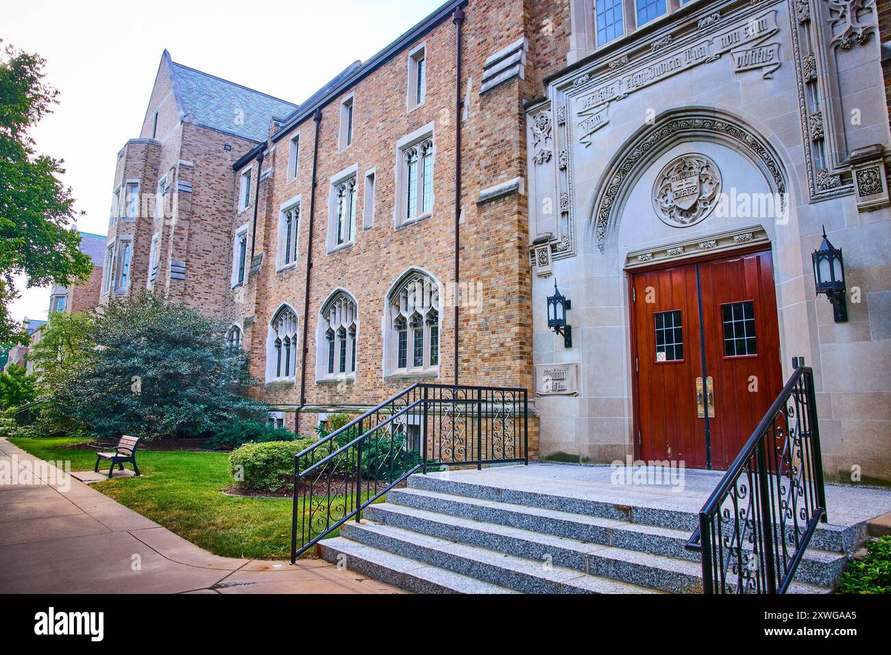 Historic Gothic Campus Building Entrance with Lush Greenery Eye-Level ...