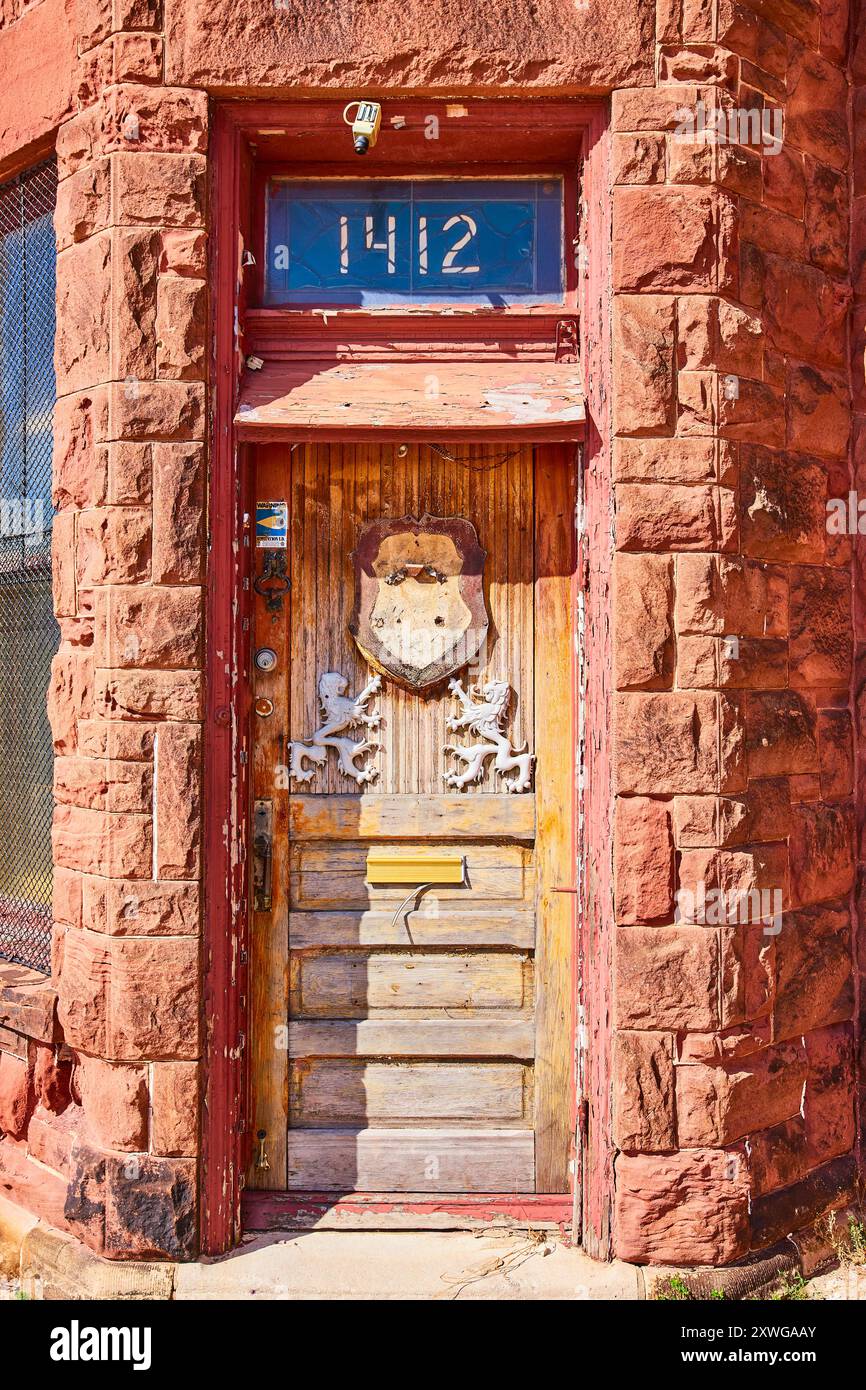 Historic Wooden Door with Number 1412 and Stone Facade Eye-Level View ...