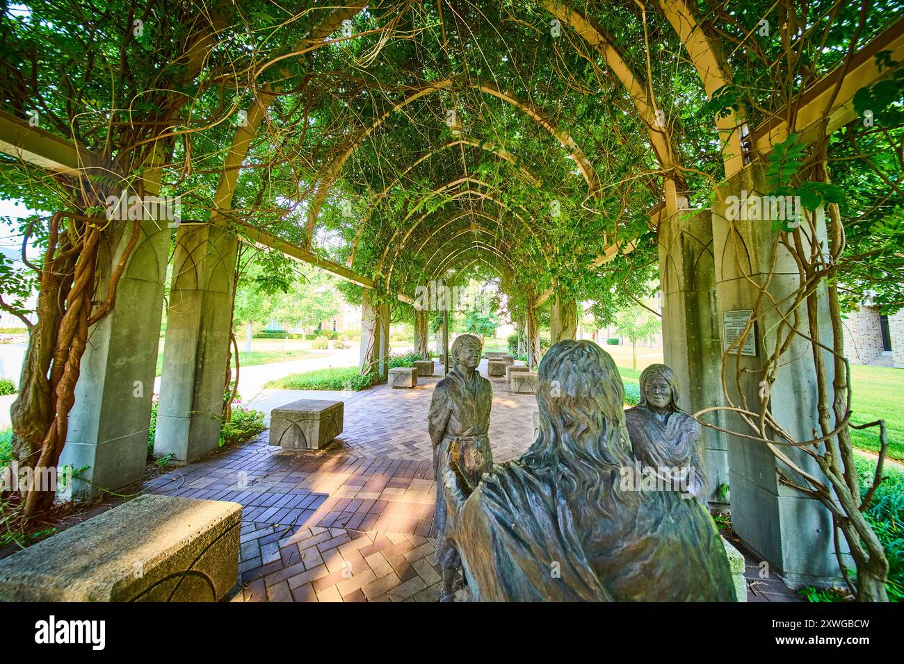 Jesus Teaching Statues Under Pergola Walkway in Tranquil College Park ...
