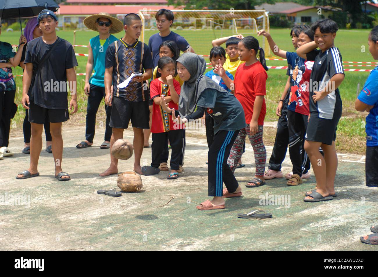 Coconut Ten Pin Bowling at a community festival, Bongkud, Ranau, Sabah ...