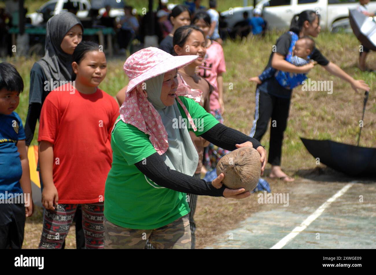 Coconut Ten Pin Bowling at a community festival, Bongkud, Ranau, Sabah ...
