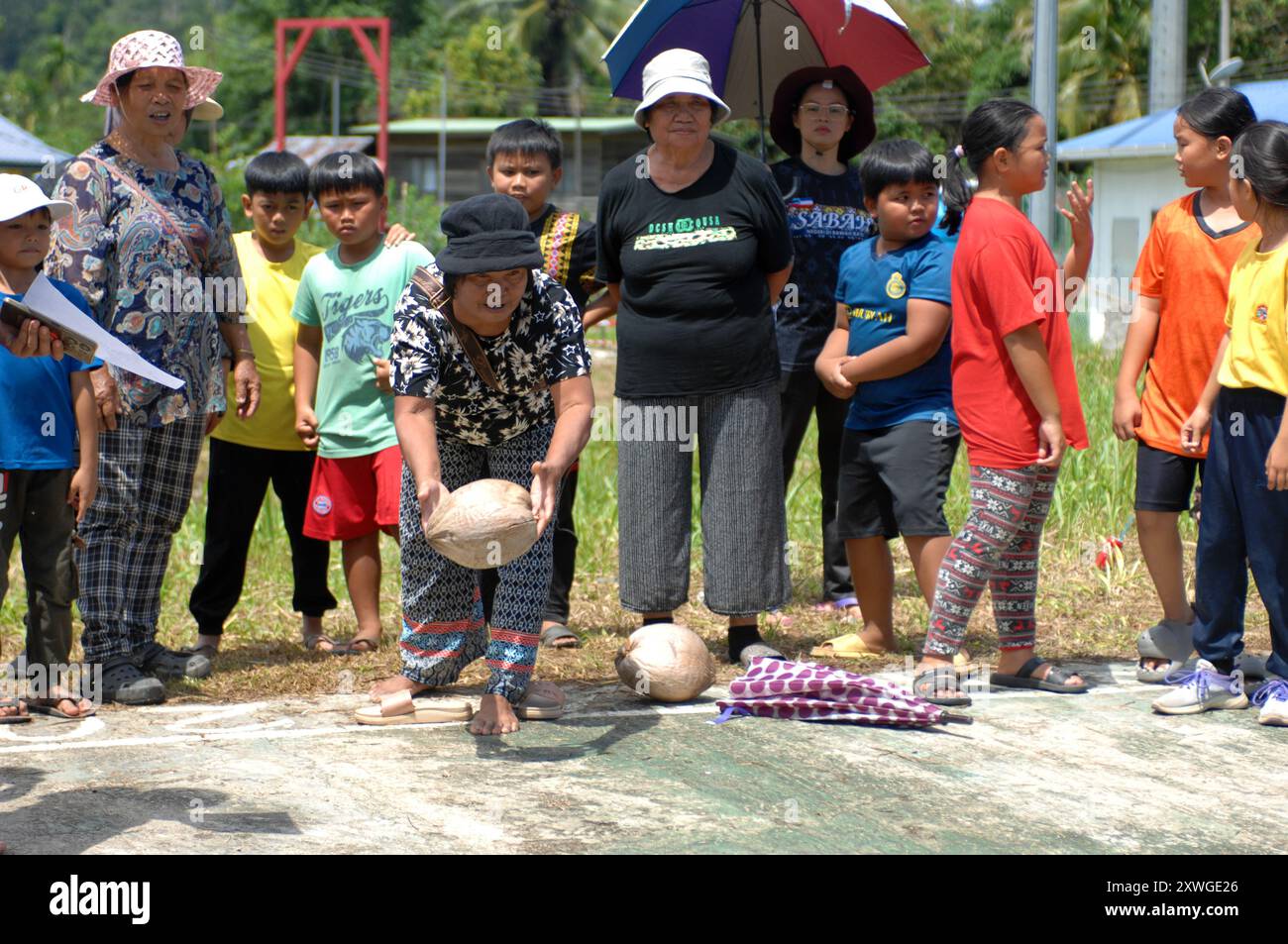 Coconut Ten Pin Bowling at a community festival, Bongkud, Ranau, Sabah ...