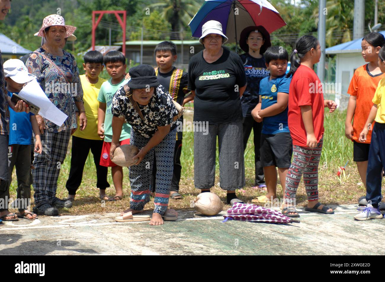Coconut Ten Pin Bowling at a community festival, Bongkud, Ranau, Sabah ...