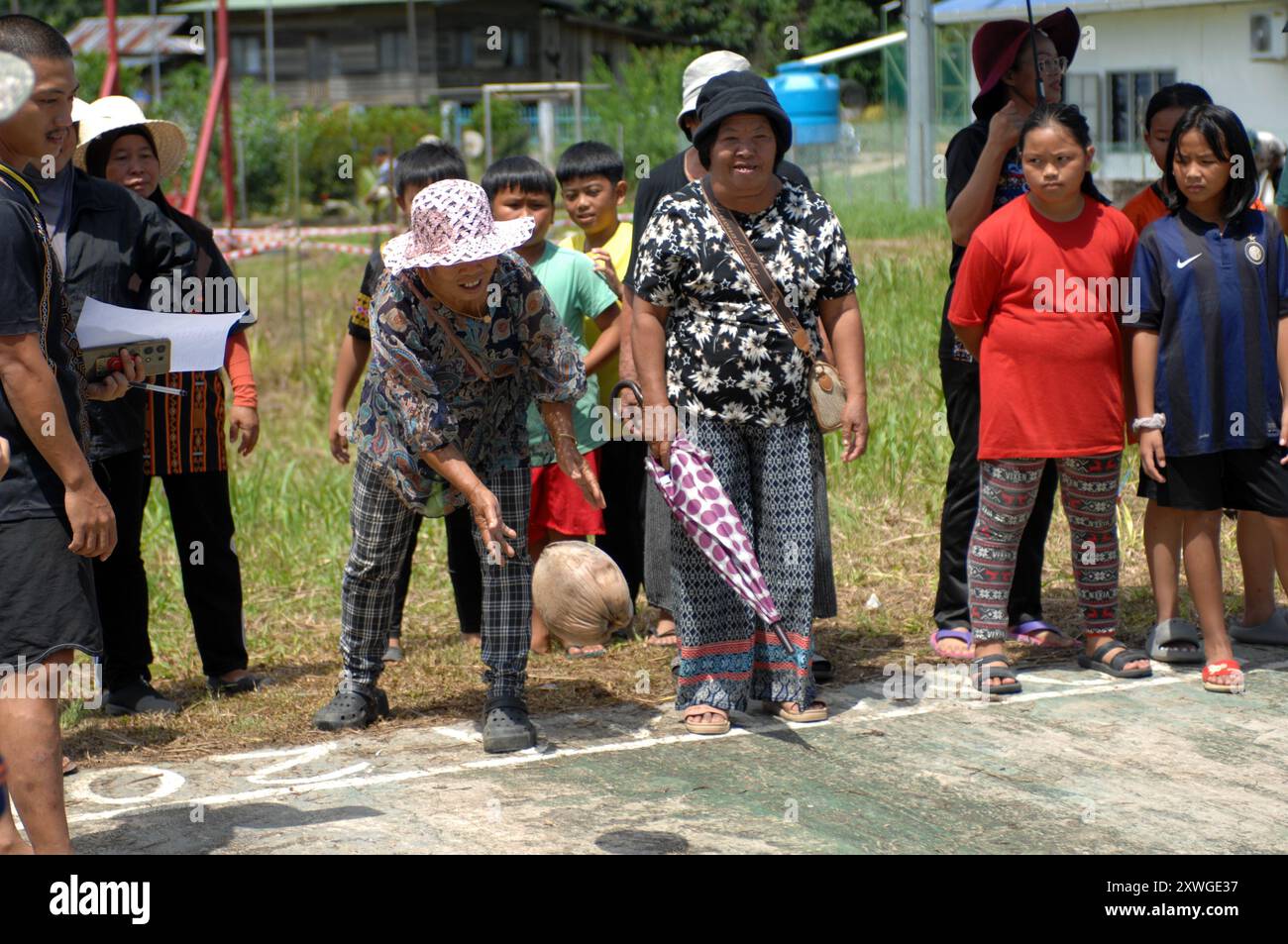 Coconut Ten Pin Bowling at a community festival, Bongkud, Ranau, Sabah ...