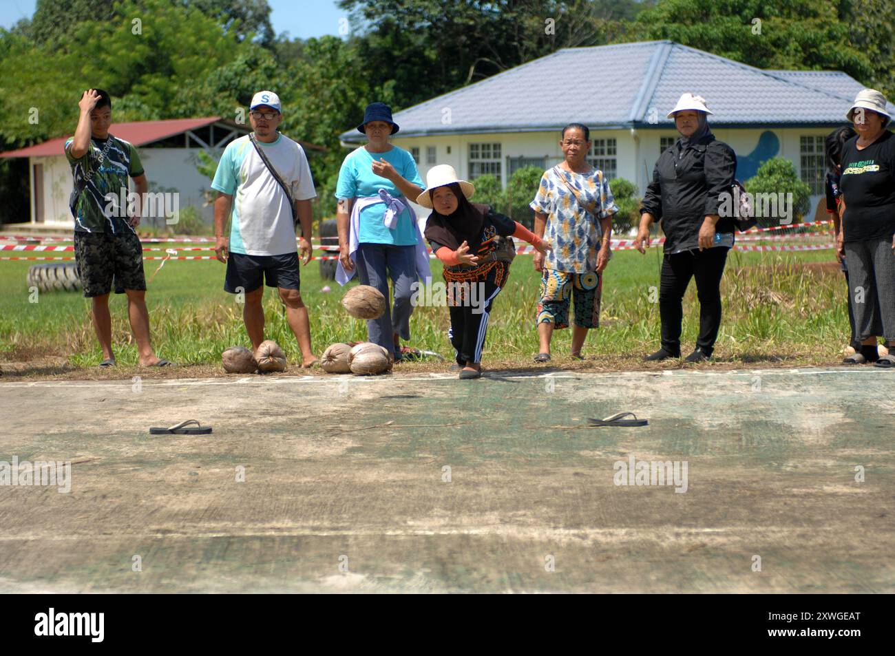 Coconut Ten Pin Bowling at a community festival, Bongkud, Ranau, Sabah ...
