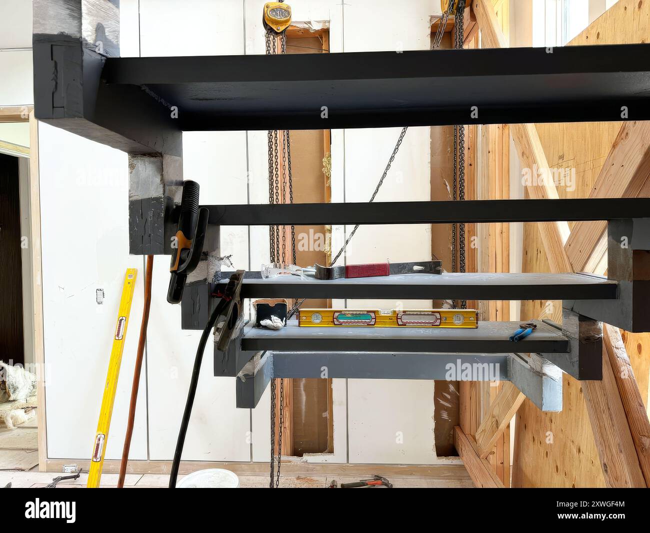 In new building, metal support stairs leading to second floor are being ...