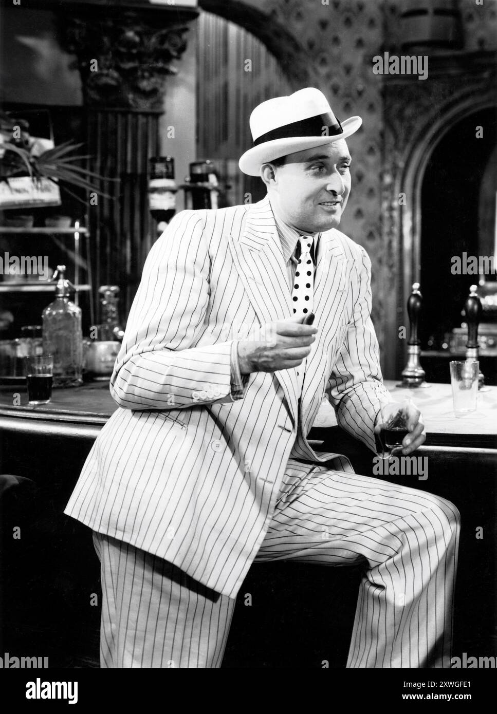 MAX MILLER standing at bar in pub in THANK EVANS 1938 director ROY ...