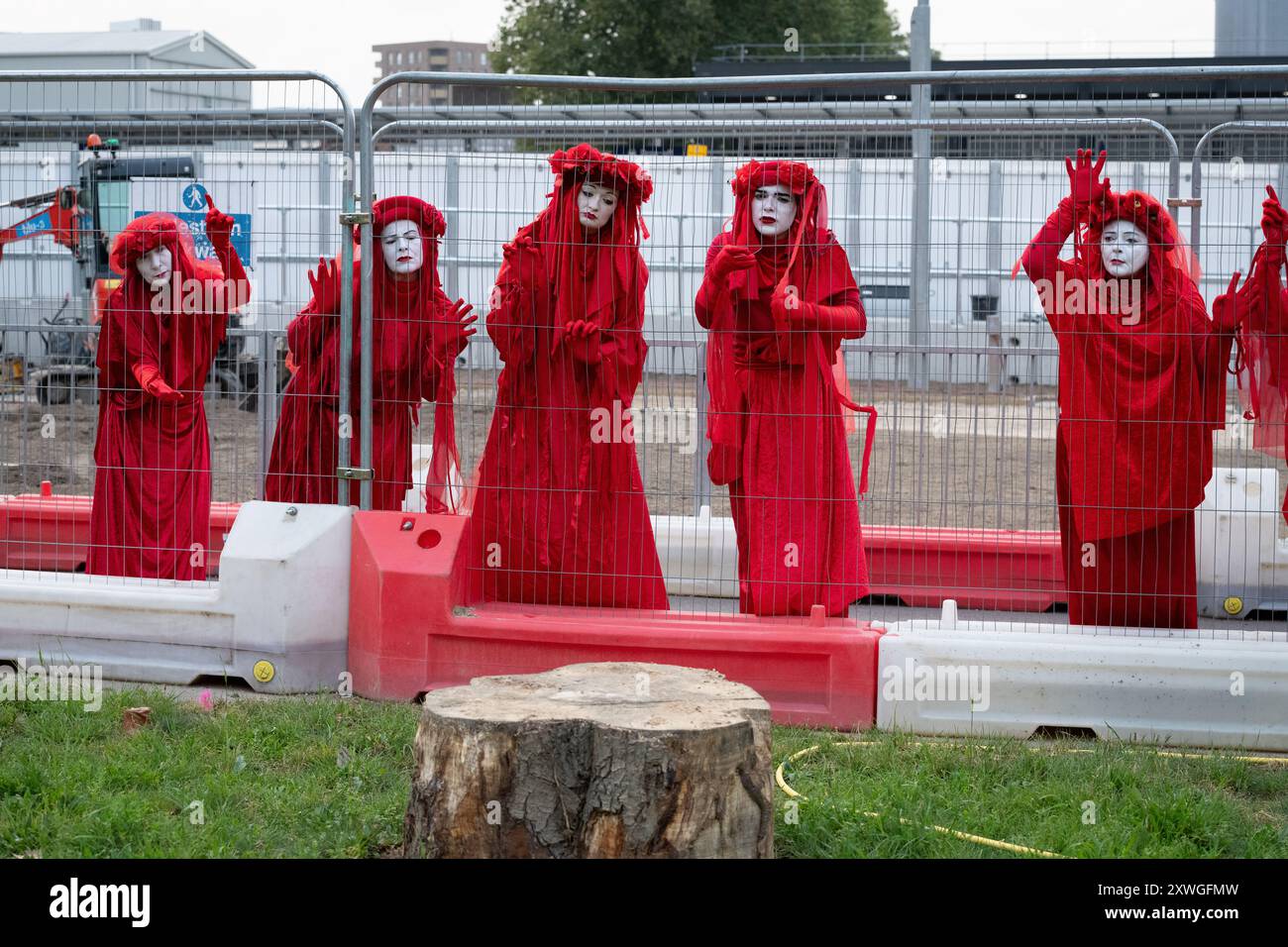 London, UK. 19 August, 2024. Extinction Rebellion's Red Rebel activist ...