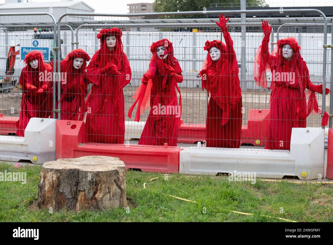 London, UK. 19 August, 2024. Extinction Rebellion's Red Rebel activist ...