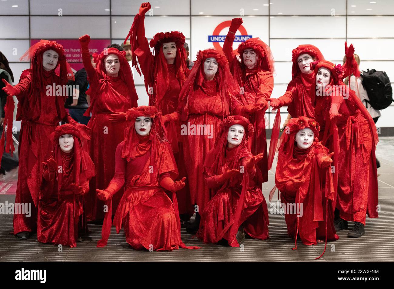 London, UK. 19 August, 2024. Extinction Rebellion's Red Rebel activist ...