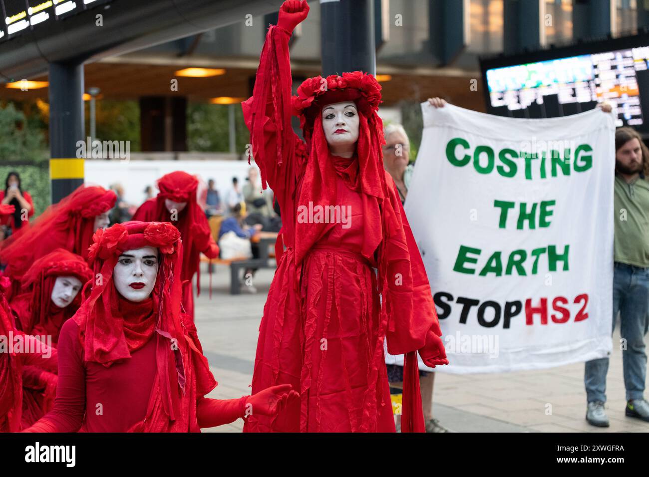 London, UK. 19 August, 2024. Extinction Rebellion's Red Rebel activist ...