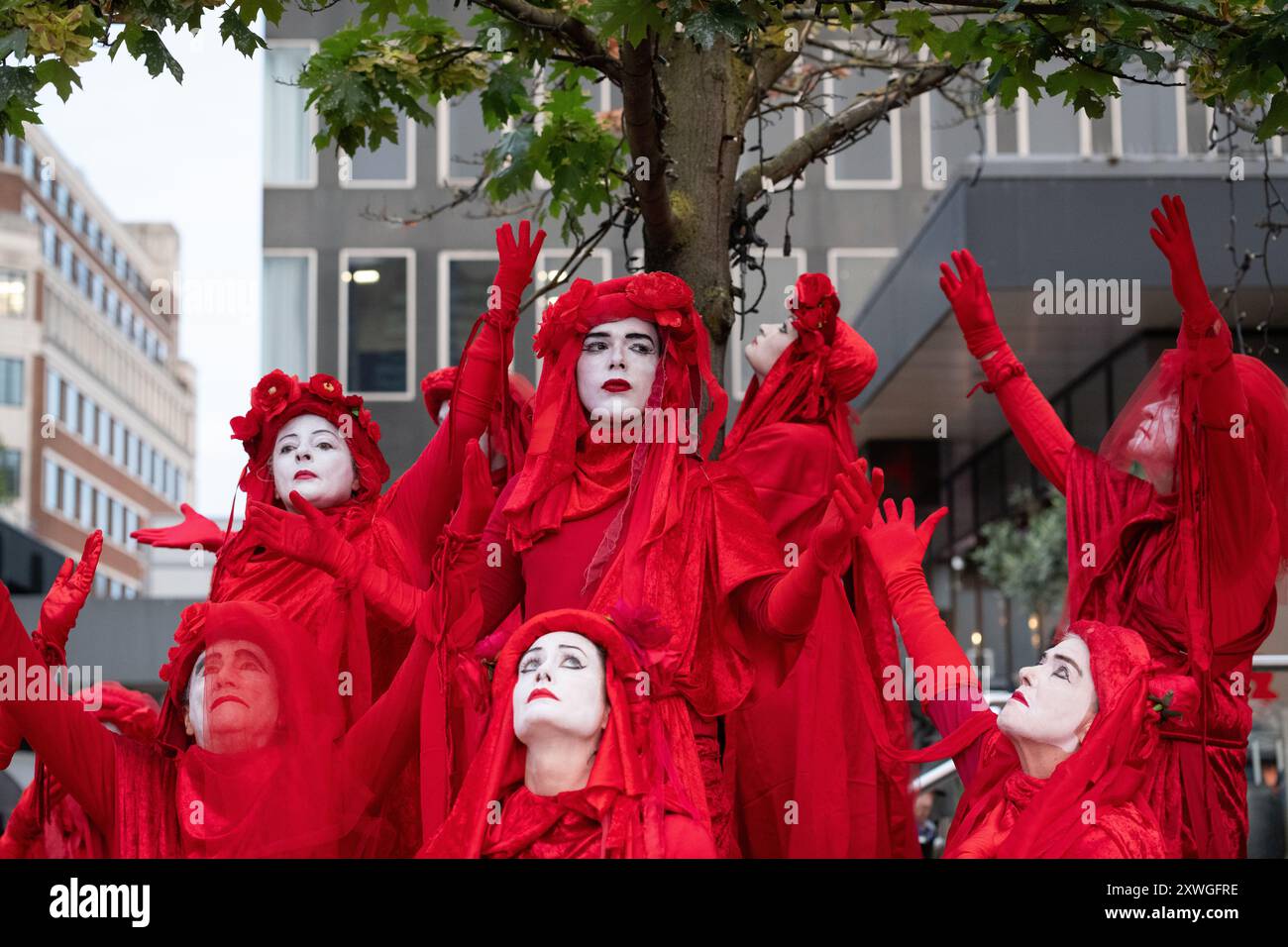 London, UK. 19 August, 2024. Extinction Rebellion's Red Rebel activist ...