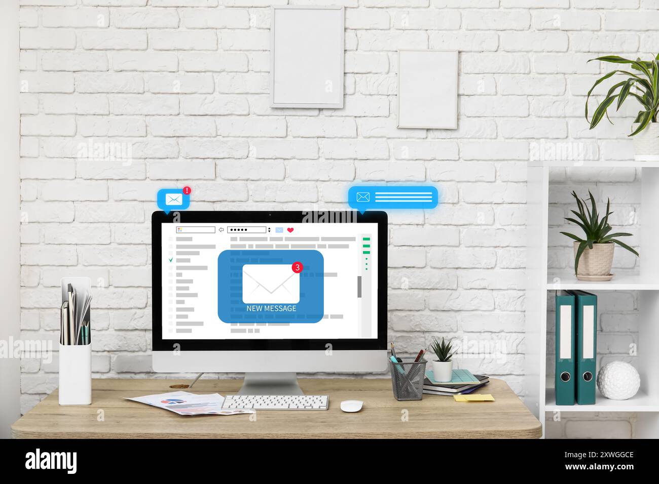 Received email messages on screen of computer monitor at workplace ...