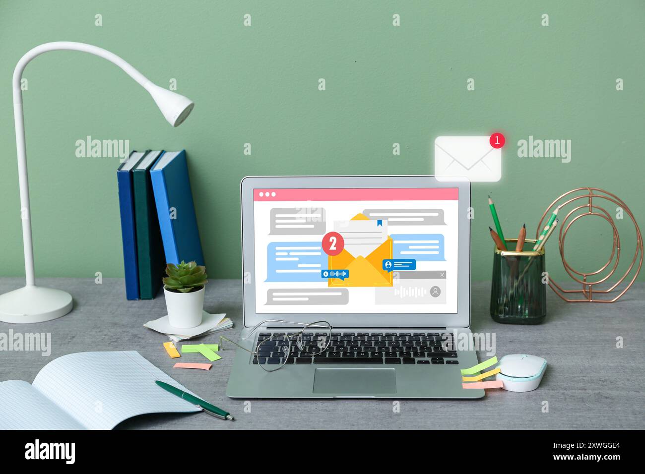 Received email messages on screen of laptop at workplace Stock Photo ...