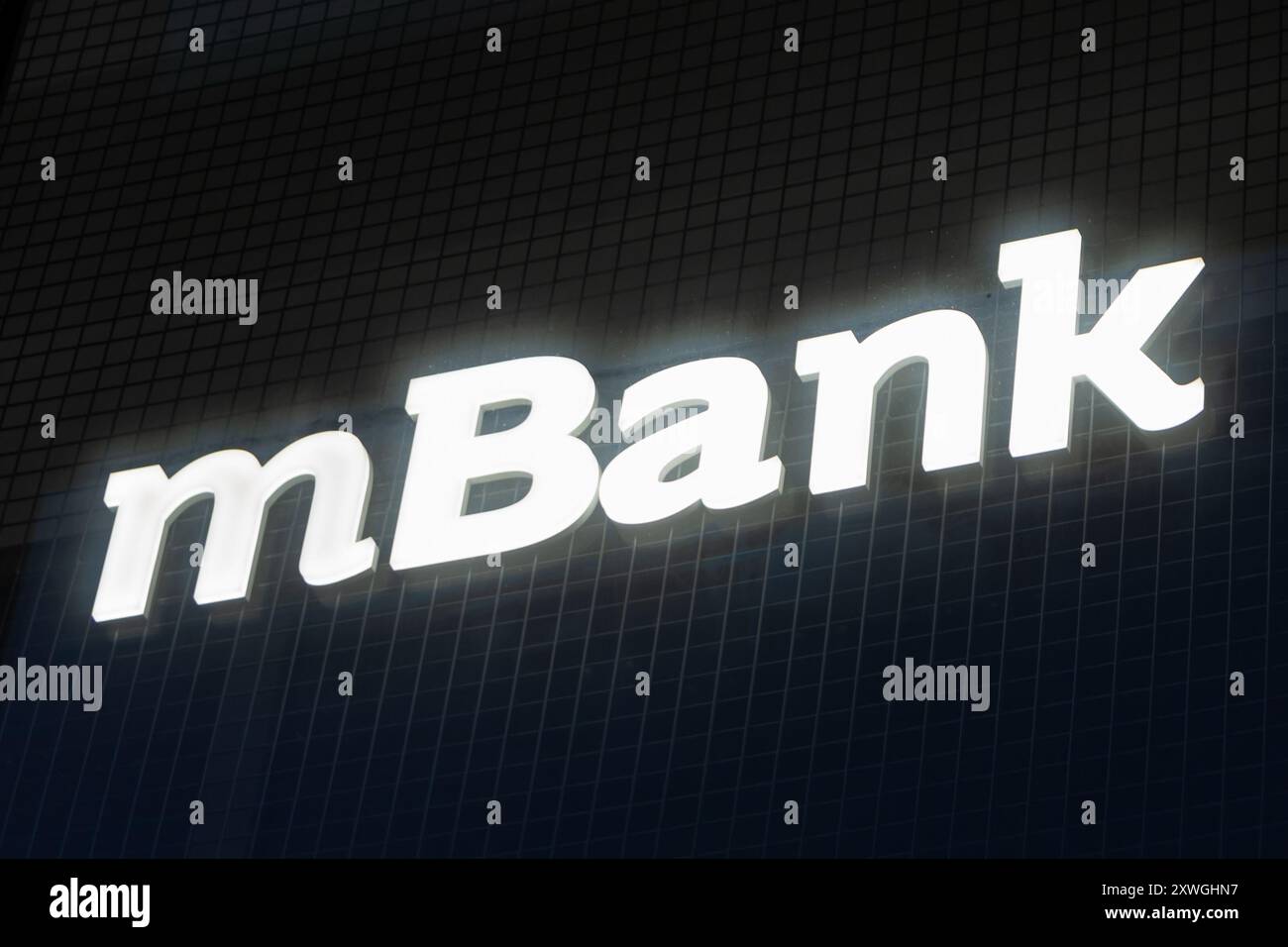 Poznan, Poland. 13 August, 2024: mBank Illuminated Sign on Glass ...