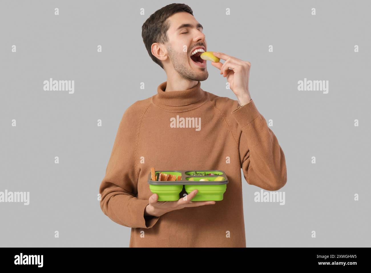 Young man lunchbox on hi-res stock photography and images - Alamy