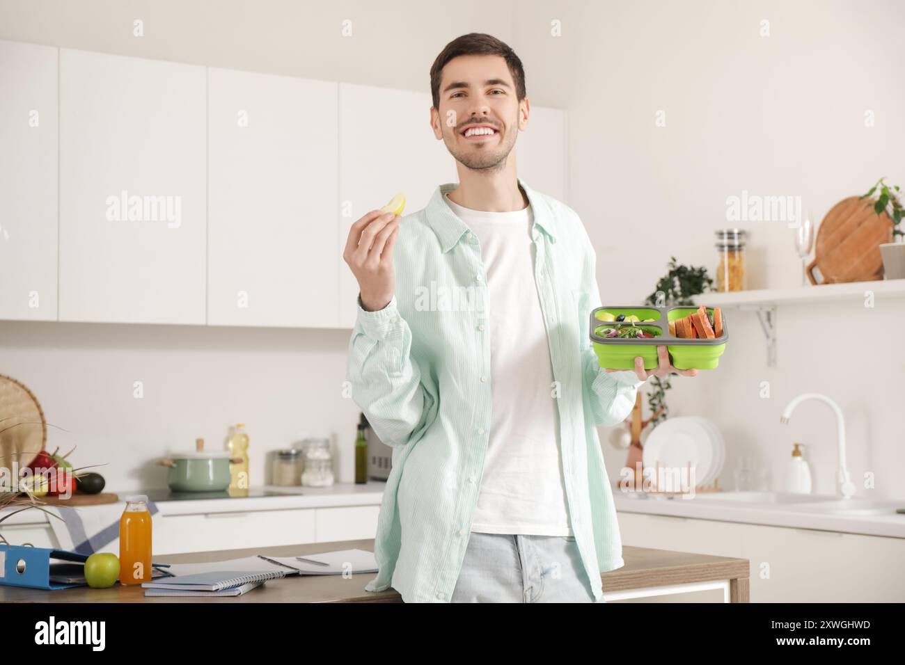 Young man lunchbox in hi-res stock photography and images - Alamy