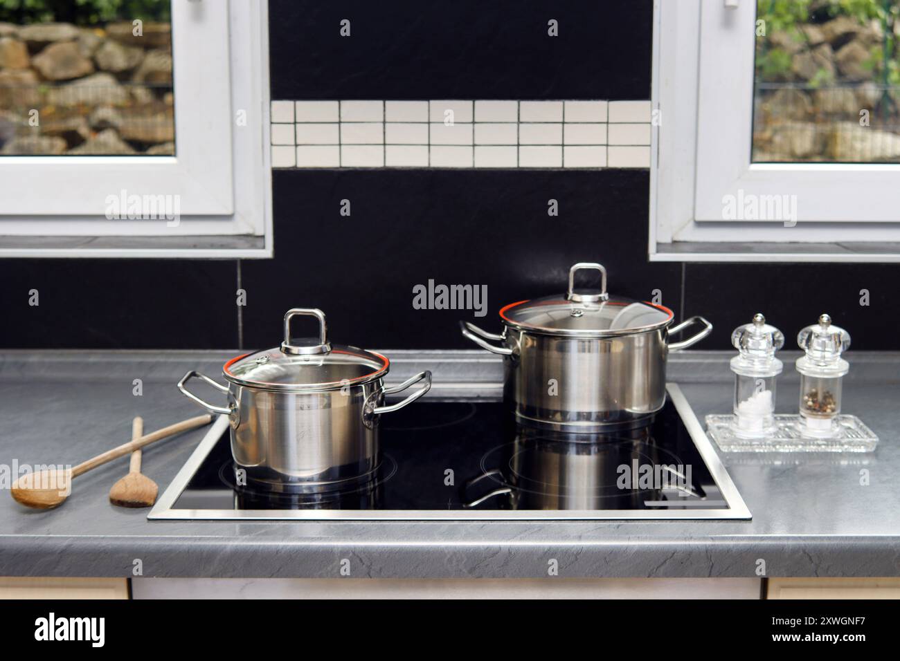 Cooking pots on the cooker Stock Photo - Alamy