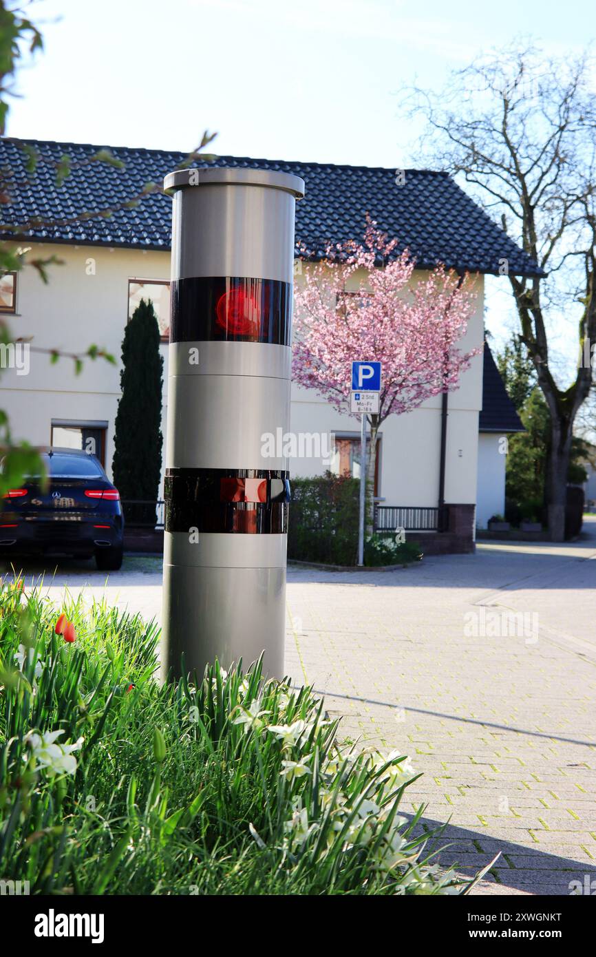 Stationary speed camera in a traffic-calmed street Stock Photo - Alamy