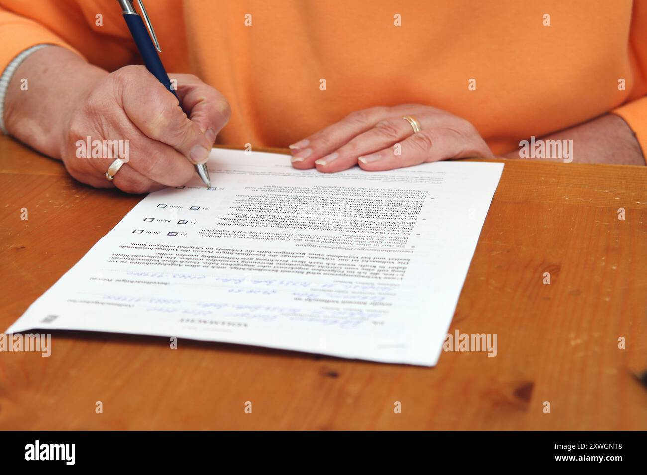 Woman filling out forms hi-res stock photography and images - Alamy