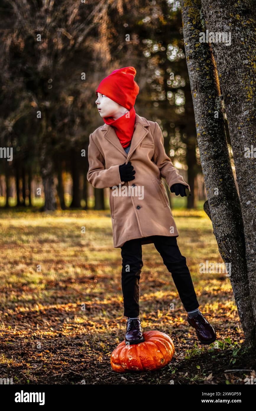 Autumn outdoor emotional portrait of a boy Stock Photo - Alamy