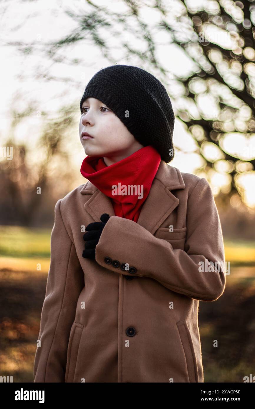 Autumn outdoor emotional portrait of a boy Stock Photo - Alamy