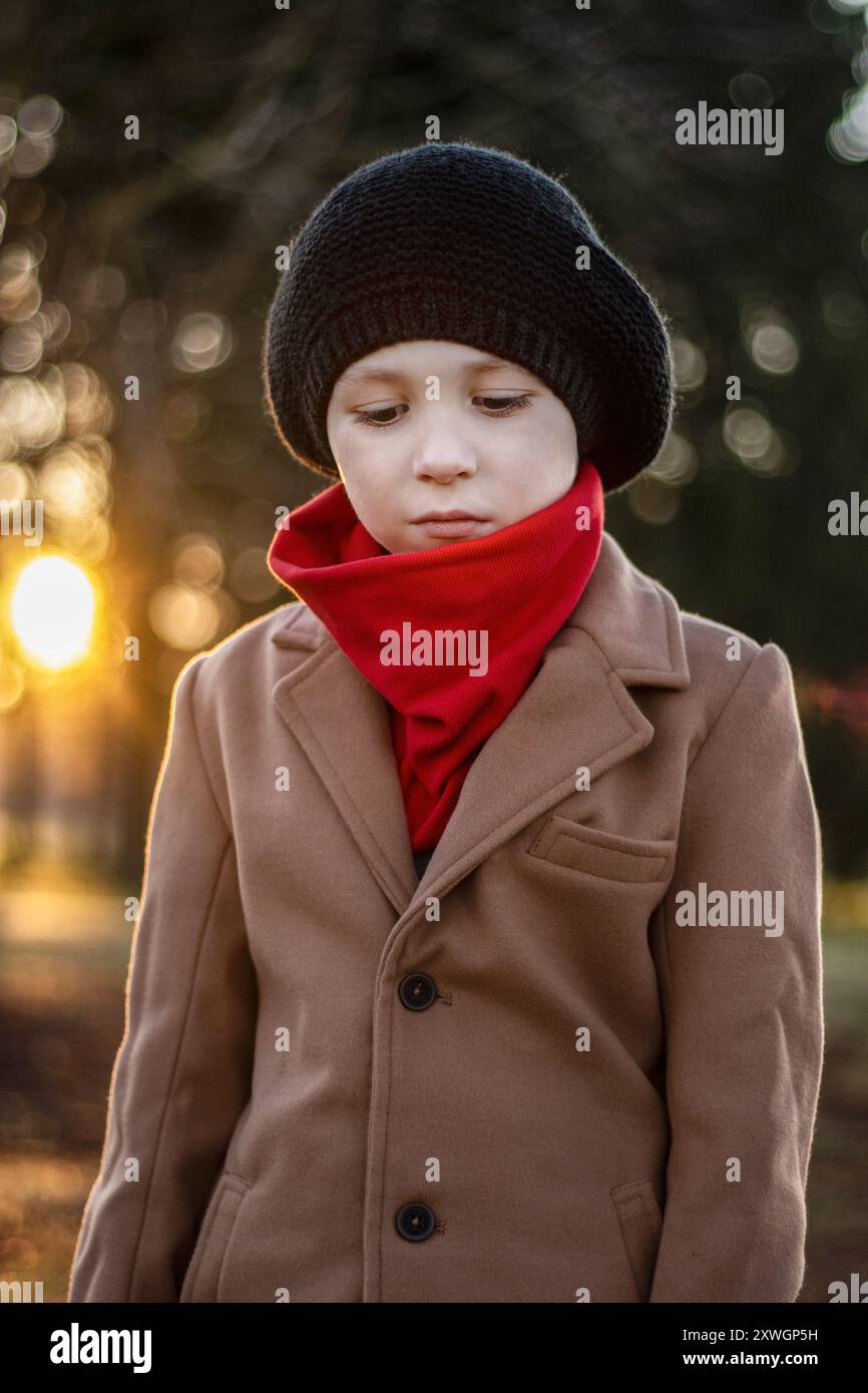 Autumn outdoor emotional portrait of a boy Stock Photo - Alamy