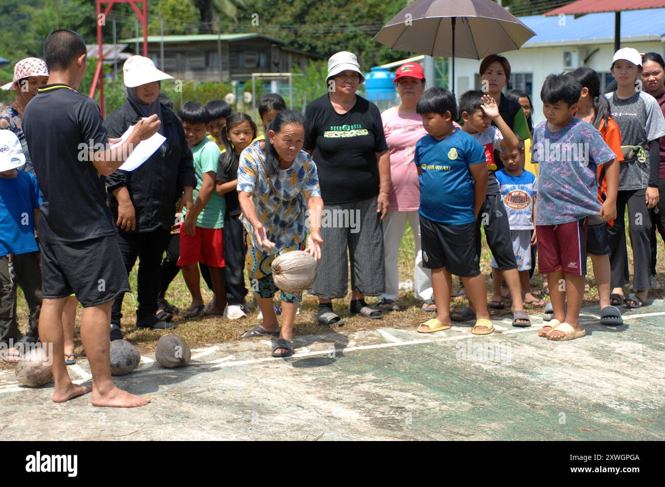 Coconut Ten Pin Bowling at a community festival, Bongkud, Ranau, Sabah ...