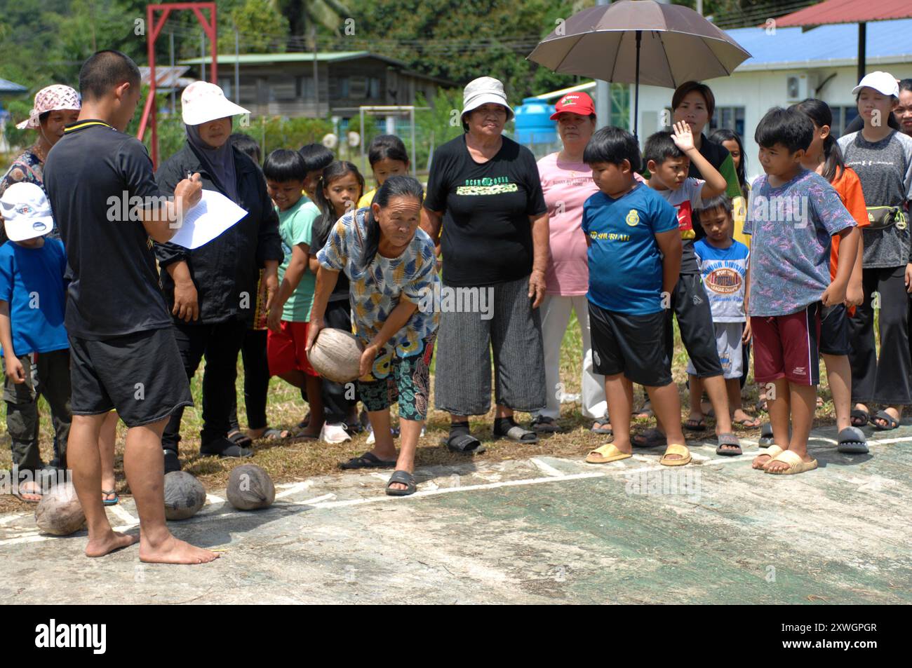 Coconut Ten Pin Bowling at a community festival, Bongkud, Ranau, Sabah ...