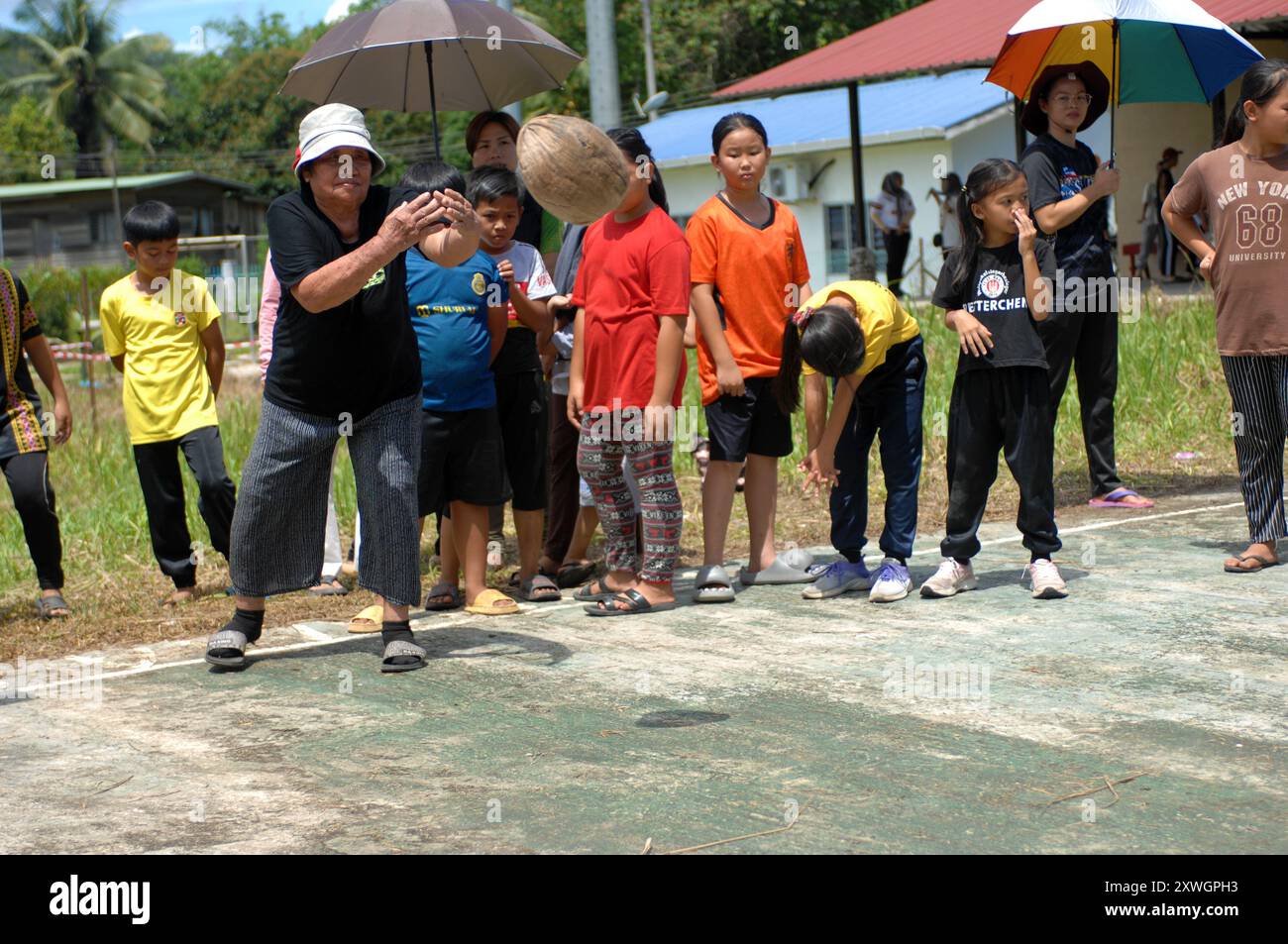 Coconut Ten Pin Bowling at a community festival, Bongkud, Ranau, Sabah ...