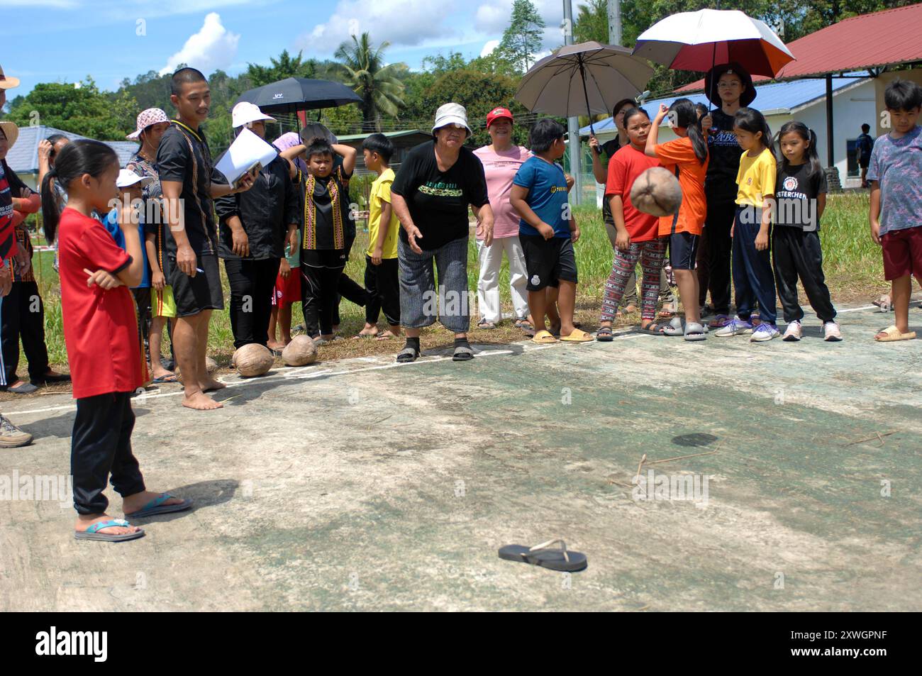 Coconut Ten Pin Bowling at a community festival, Bongkud, Ranau, Sabah ...
