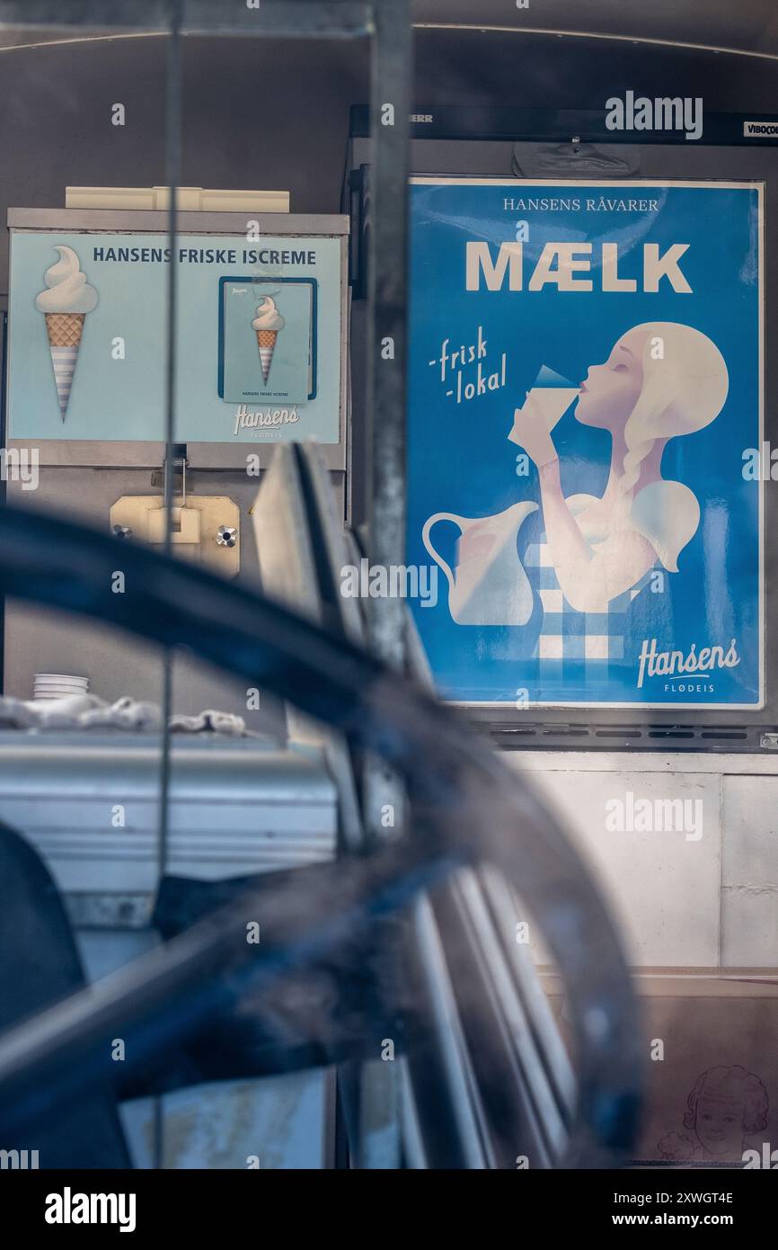 A vintage "Maelk" (milk) poster in an ice cream truck in Denmark Stock ...