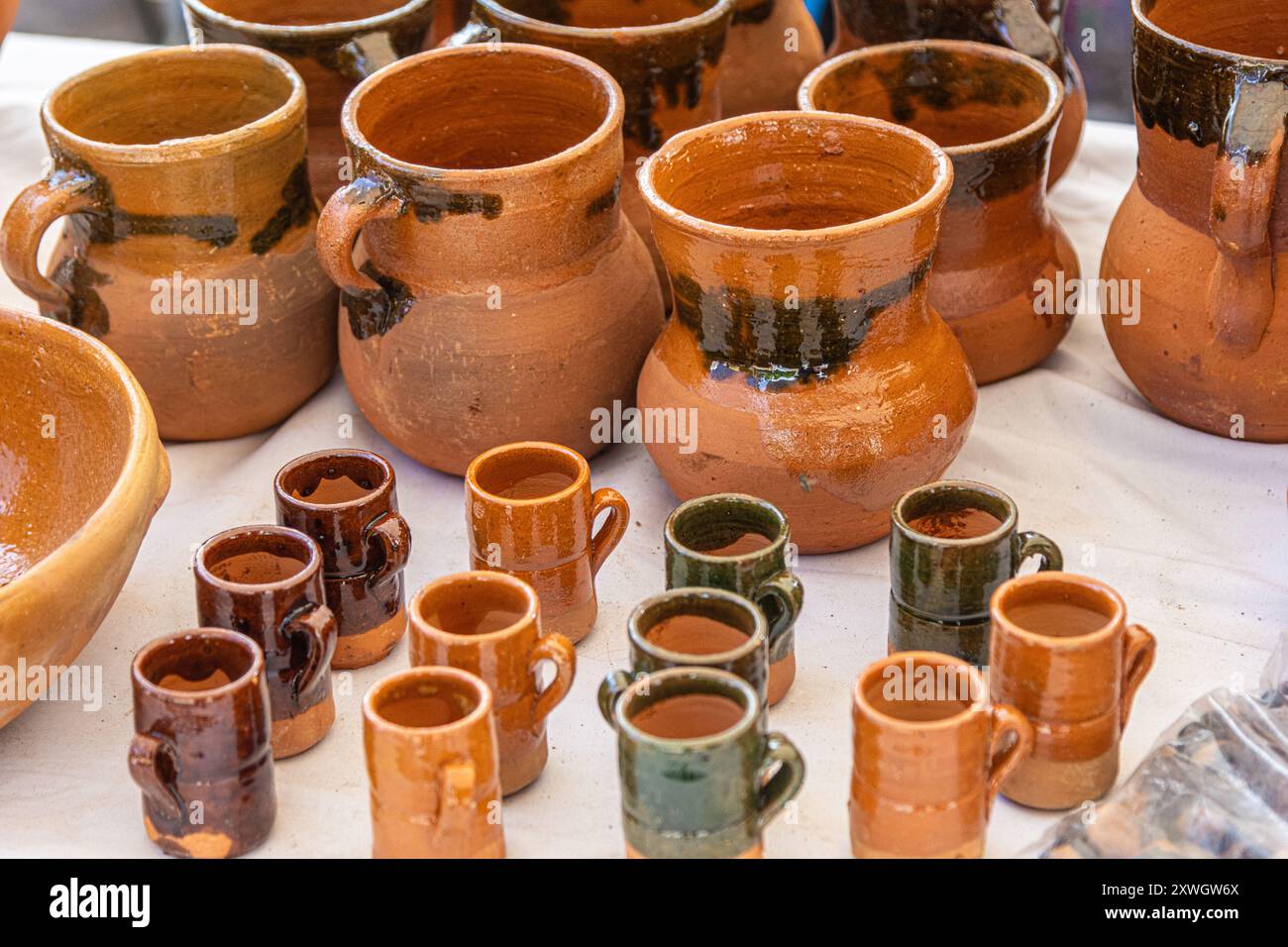 Clay jars made by Mexican artisan hands Stock Photo - Alamy