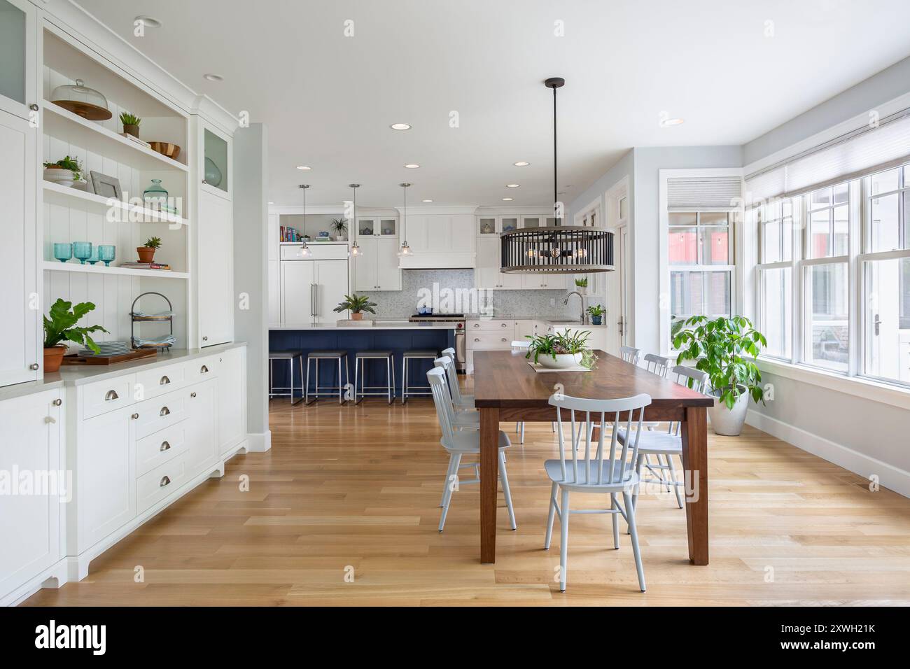 Lots of natural light coming through wall of windows hi-res stock ...