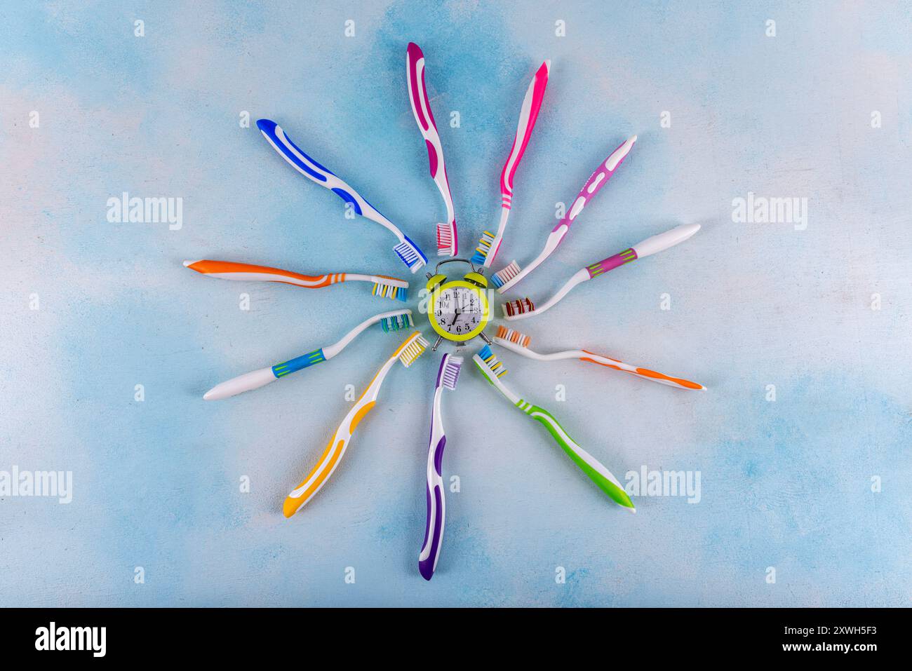 A close up of many different types of toothbrushes.Colored toothbrushes ...