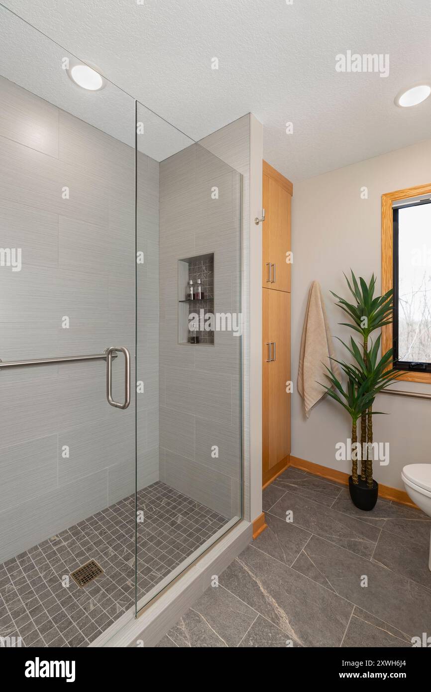 Walk-in shower with glass wall and door Stock Photo - Alamy