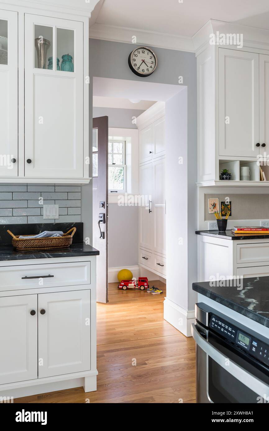 View from kitchen into back hallway and mudroom in remodeled kitchen ...