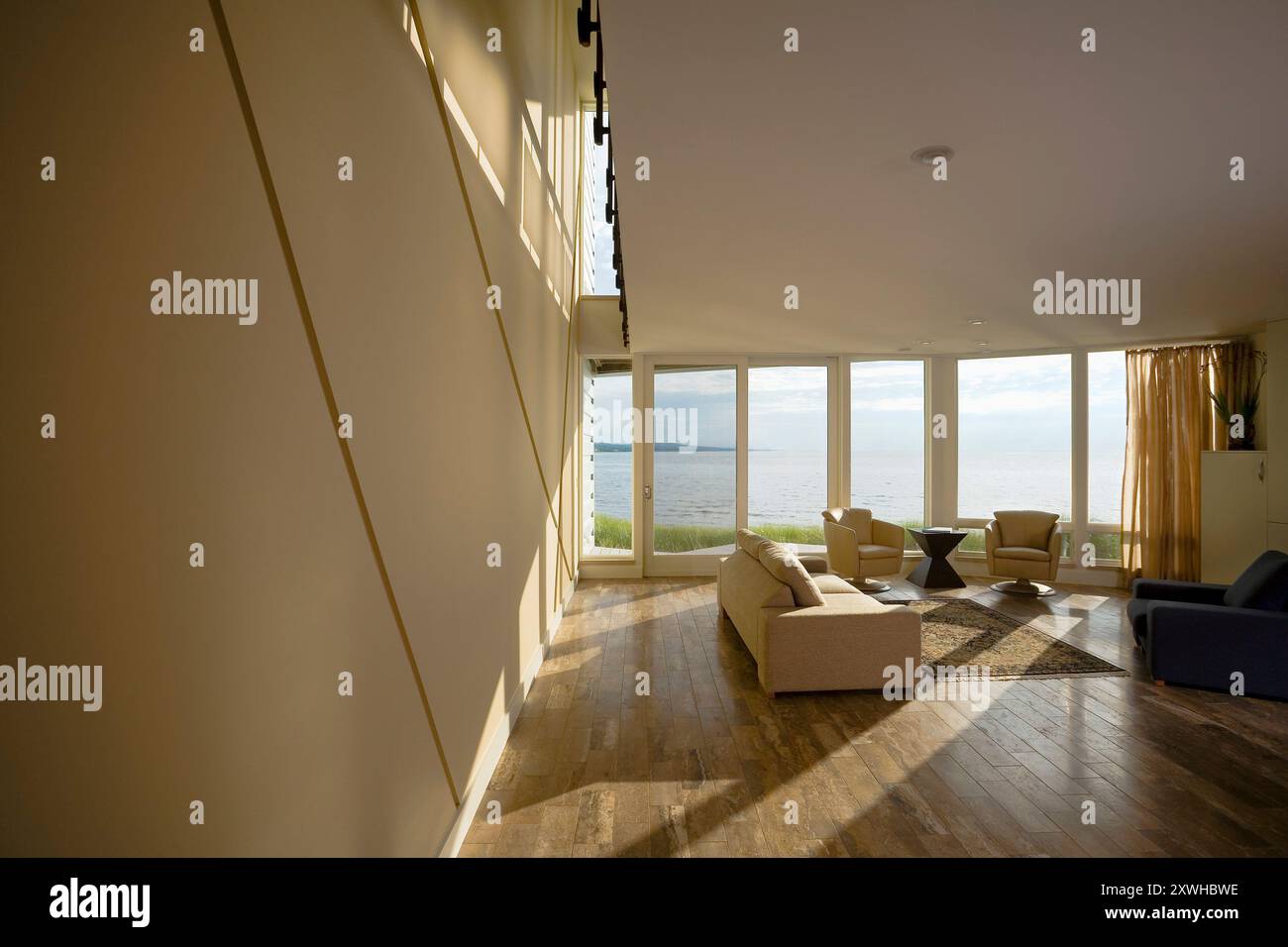 Modern condominium living room showing view up to second level Stock ...