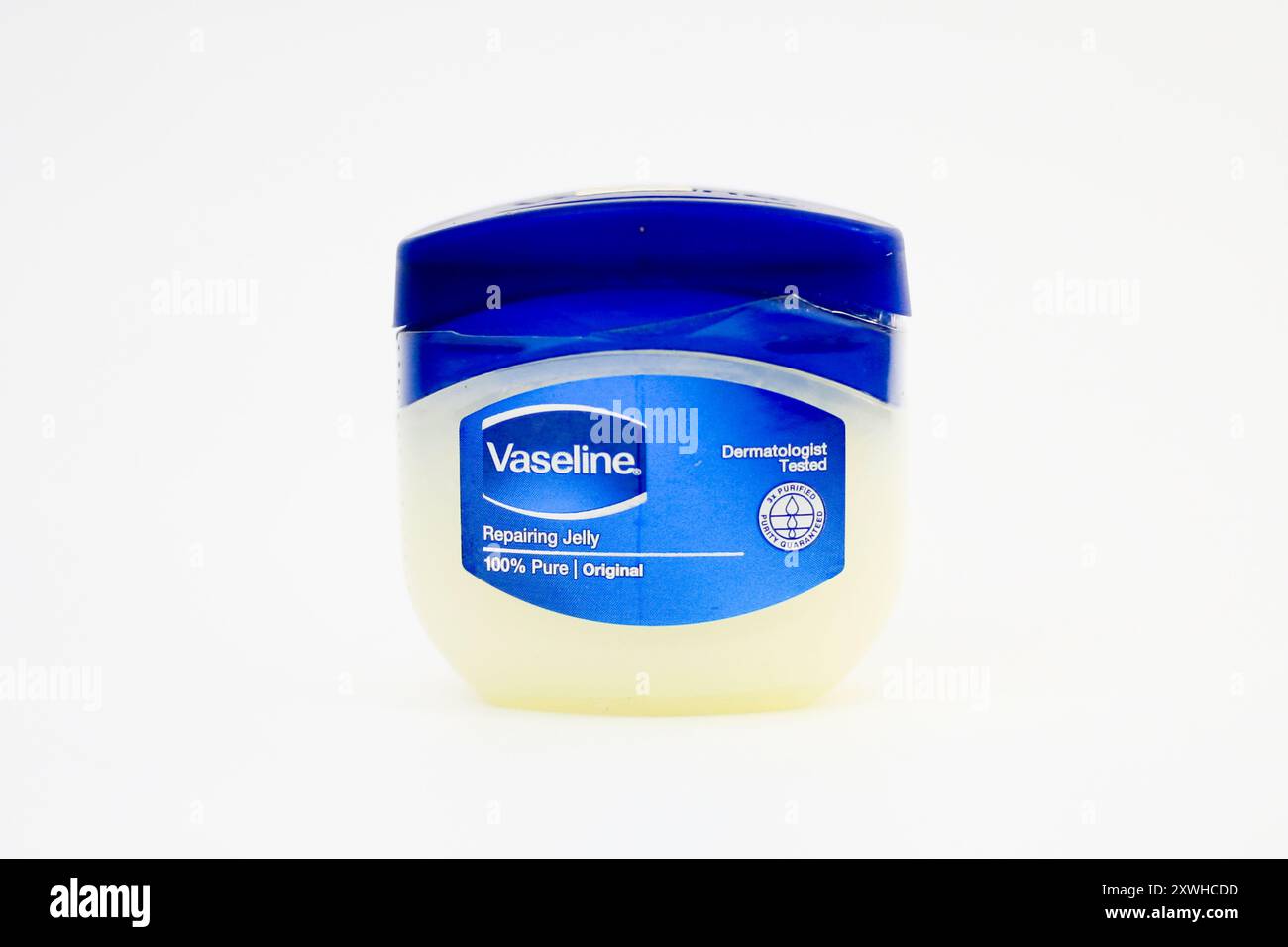 Close up a jar of Vaseline Repairing Jelly isolated on white background ...