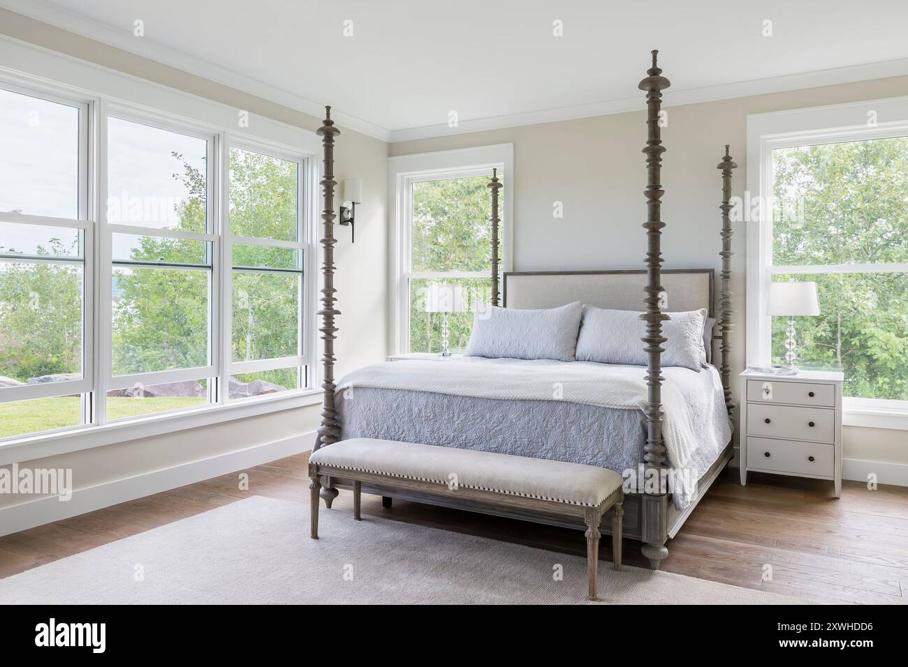 Tall intricate design of posters on four poster bed hi-res stock ...