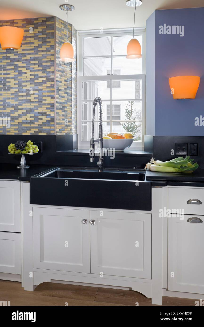 Kitchen sink and window with beautiful black anthracite countertops ...
