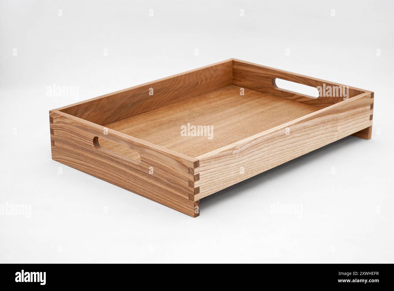 Solid ash wood tray with dovetail joints and cutout handles on the ...