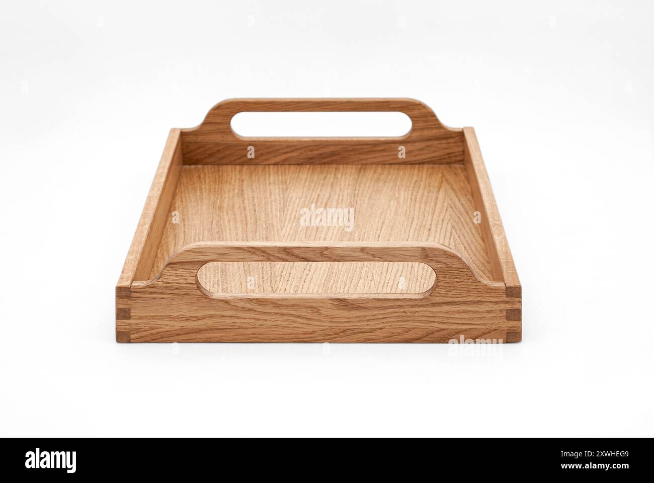 Elegant solid oak wood tray with dovetail joints and carved handles on ...
