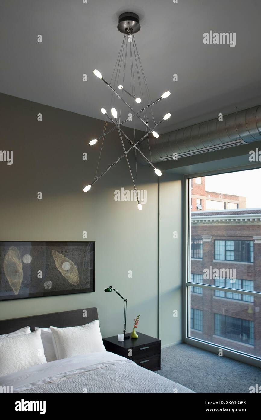 Modern light fixture looks like several batons strung together w hi-res ...