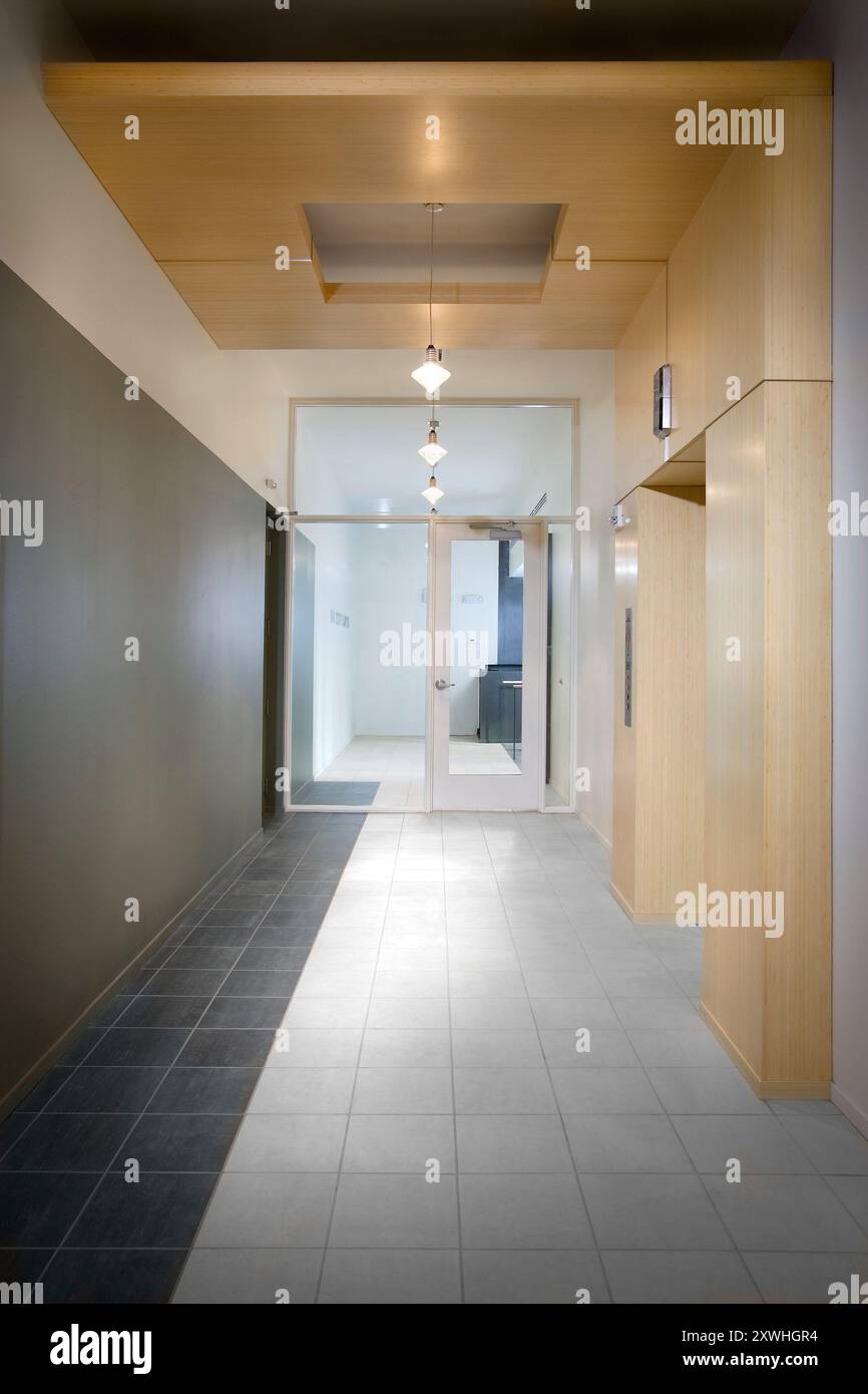 Lobby of condominium with bamboo around elevator Stock Photo - Alamy
