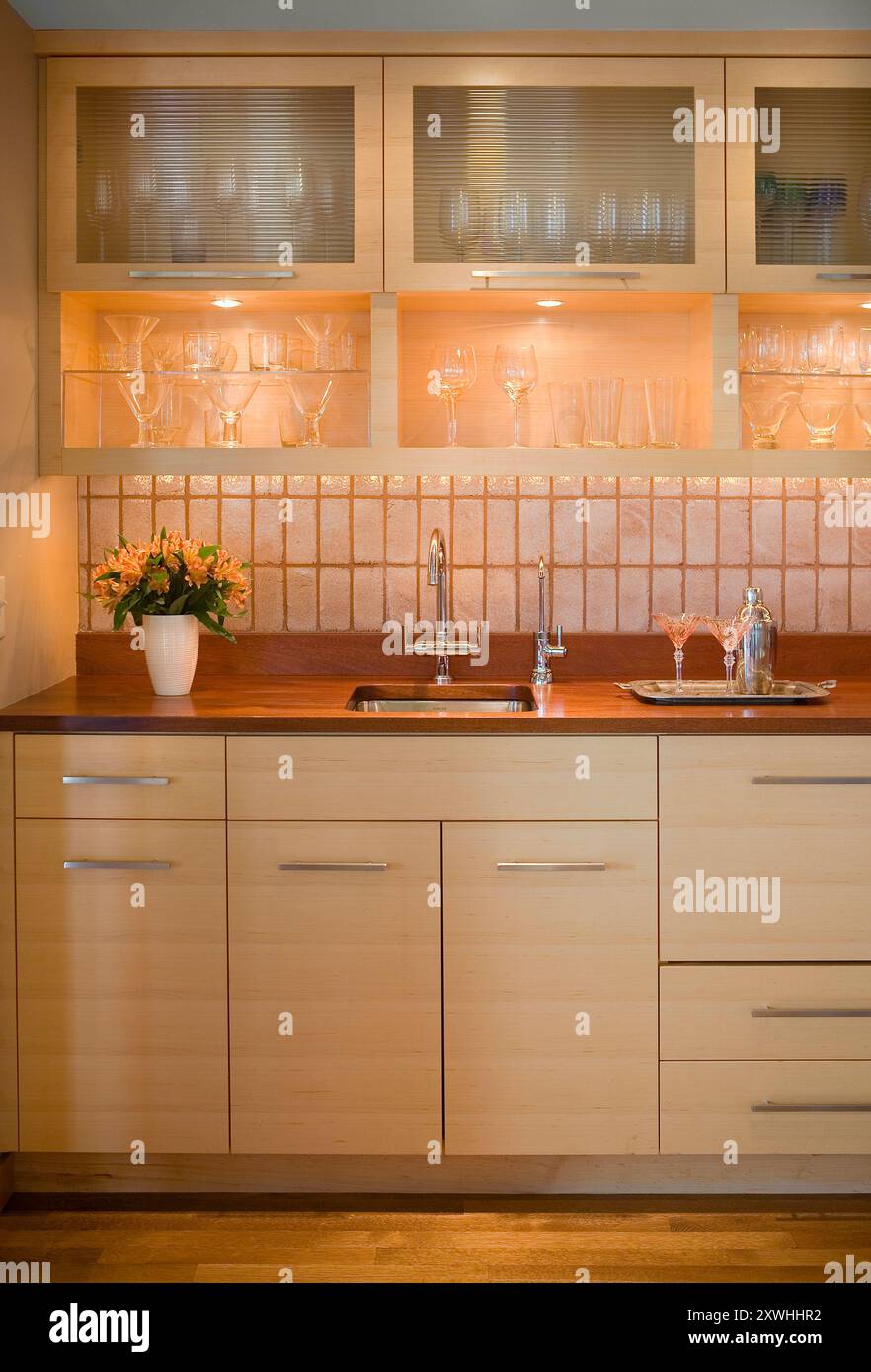 Bar and sink area in modern kitchen Stock Photo - Alamy